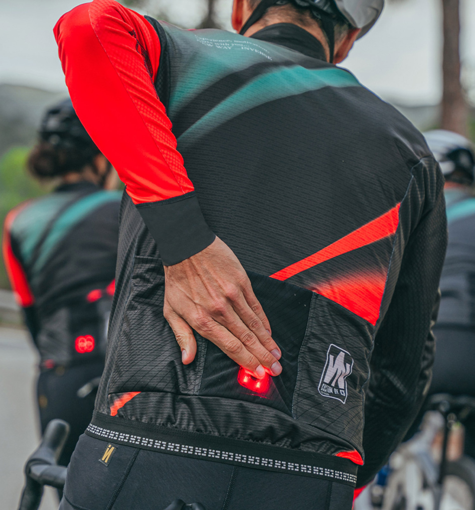 Custom cycling jacket with safety light ANTARES | Inverseteams